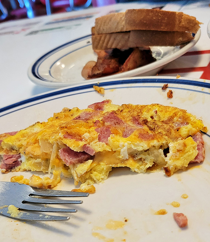 This ham-studded omelet isn't just breakfast, it's an edible work of art that makes you wonder why we don't eat breakfast for every meal.