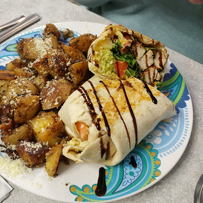 Breakfast burrito brilliance&mdash;where home fries dusted with parmesan meet a wrap stuffed with morning essentials. Your diet plan's worthy nemesis.