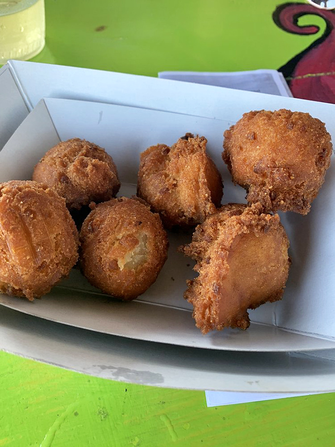 Hush puppies so perfectly golden they should be in a museum. Or better yet, in your mouth immediately.