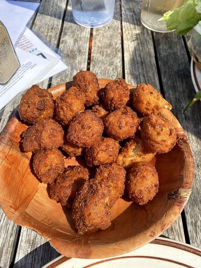 These hush puppies aren't just golden brown&mdash;they're little cornmeal meteors of joy that might cause involuntary happy noises.