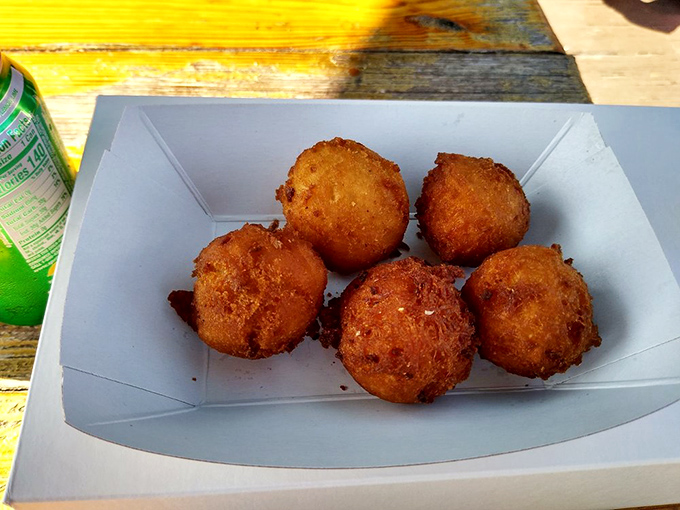 These golden orbs of cornmeal perfection might be called "hush puppies," but they'll have you making very loud sounds of approval. 