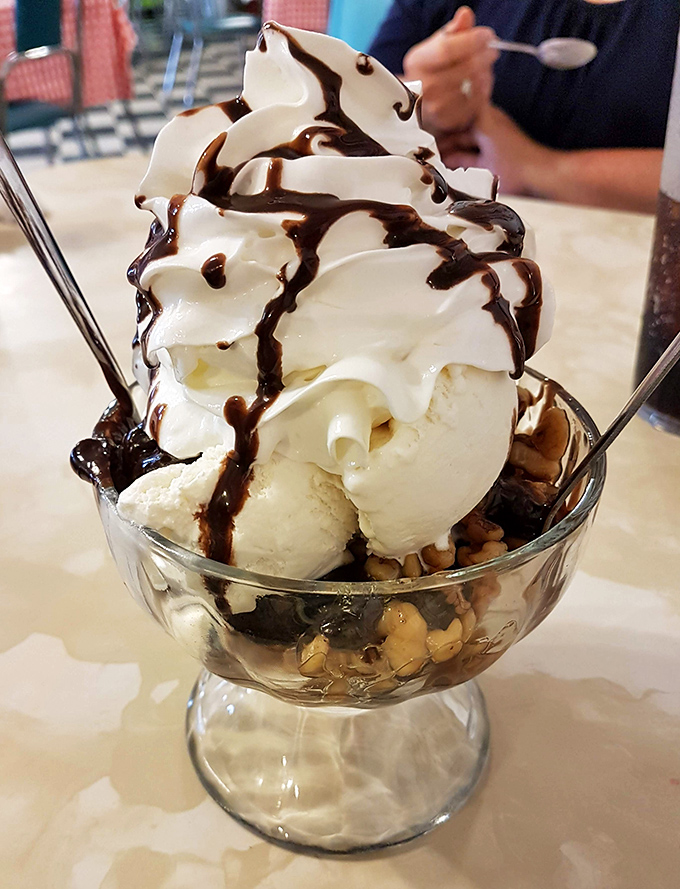 This isn't just a sundae&mdash;it's an architectural marvel of ice cream, hot fudge, and whipped cream that demands to be photographed before devoured.