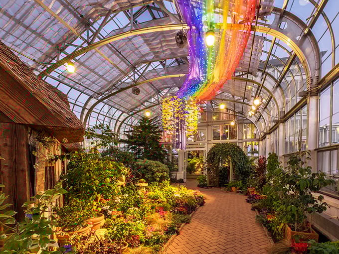 Inside the Conservatory, a rainbow installation dances overhead, proving that even in winter, this garden knows how to throw a color party.