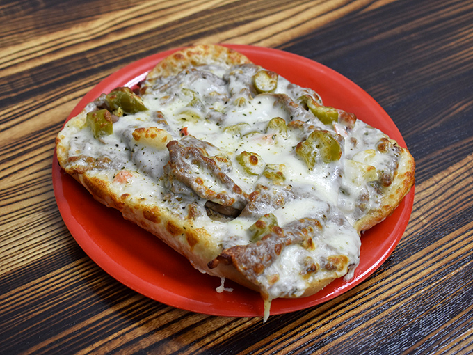 The Italian beef sandwich &ndash; Chicago's other culinary masterpiece &ndash; arrives loaded with melty cheese and peppers. Napkins required, no exceptions.