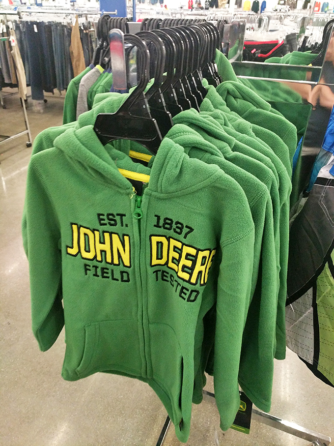 John Deere green fleece jackets hang in formation, ready to outfit Pennsylvania's practical-minded shoppers for less. 
