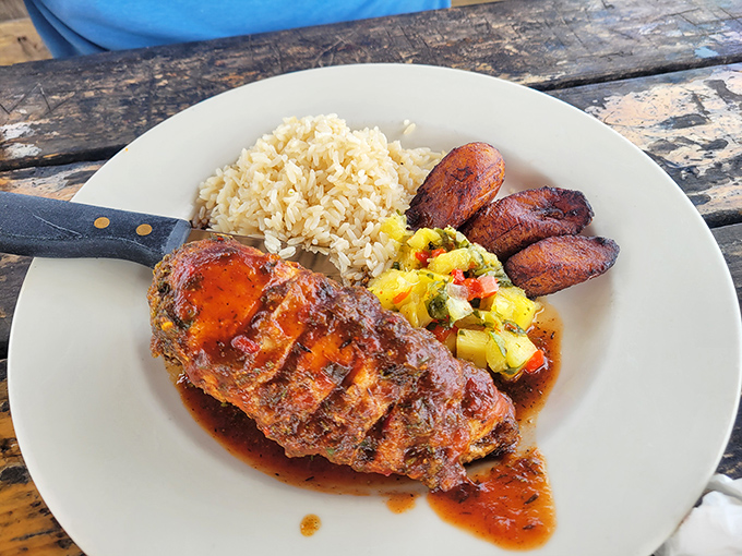 Jerk chicken that transports you straight to Jamaica, complete with plantains and rice that would make your Caribbean grandmother proud.