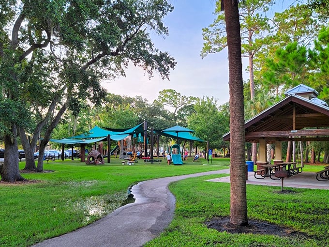 Weaver Park offers that increasingly rare Florida commodity: shade. Kids play while parents enjoy the blissful sound of... absolutely nothing urgent.
