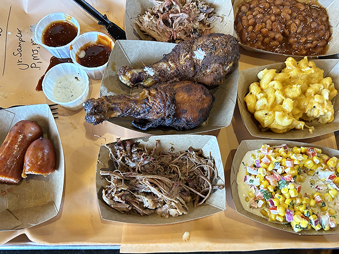 The sampler platter&mdash;nature's way of saying "why choose one meat when you can have them all?" Note the corn relish providing the illusion of vegetable responsibility.