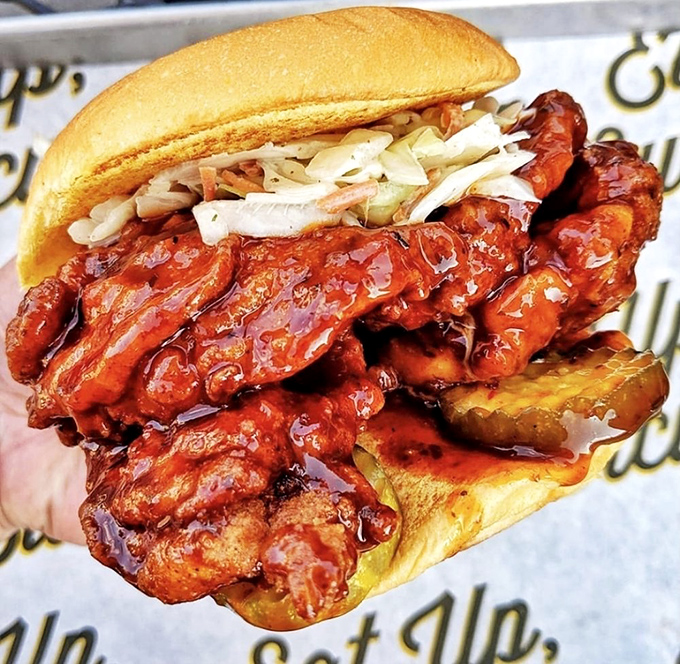 The Korean BBQ sandwich isn't messing around. That glossy sauce coating crispy chicken is the culinary equivalent of a warm hug from Seoul.