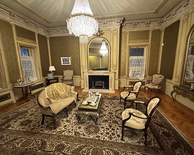 The Ladies Reception Room exudes Gilded Age elegance with its crystal chandelier and ornate fireplace&mdash;just waiting for someone in a corset to make an entrance.