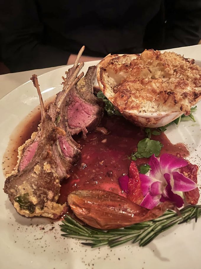 Rack of lamb presented with artistic flair—the kind of dish that makes nearby diners crane their necks and whisper, "I'll have what they're having."