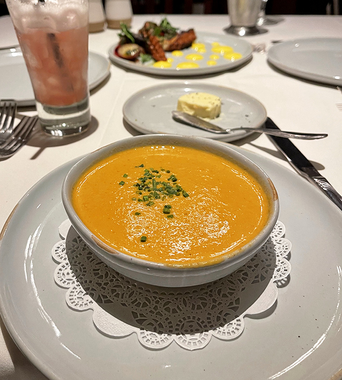 This lobster bisque doesn't just warm your stomach&mdash;it hugs your soul. The paper doily underneath is purely ceremonial; you'll want to lick the bowl.