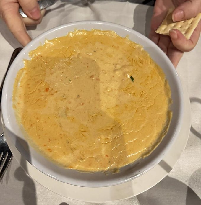 This lobster bisque isn't just soup&mdash;it's liquid gold. Creamy, rich, and demanding to be scooped up with those crackers.