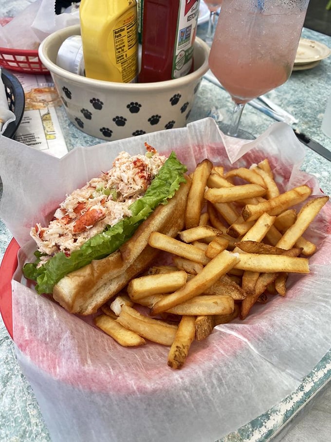 Lobster roll perfection: sweet meat, minimal fuss, maximum flavor. The kind of sandwich that makes you question why you'd eat anything else near the ocean.