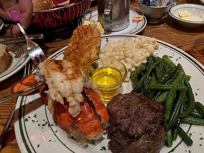 Surf meets turf in this showstopper&mdash;a lobster tail that practically high-fives your steak while creamed corn and green beans provide moral support.