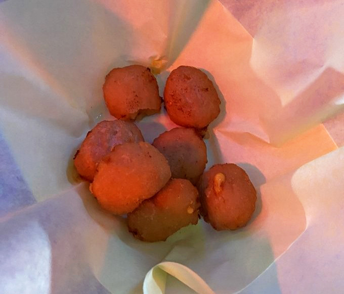 These aren't your average mac and cheese bites. They're little golden nuggets of childhood comfort food, all grown up and ready to party.