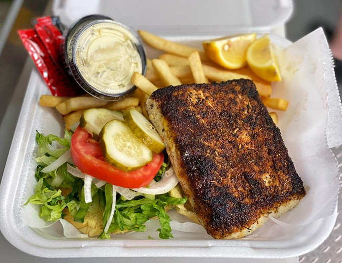 Blackened mahi perfection with a spice crust that should be illegal. Paired with crisp veggies and golden fries, it's Florida on a plate.