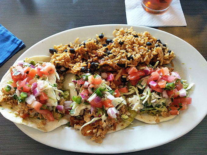 These Mahi-Mahi tacos aren't just dinner; they're a vacation for your taste buds, complete with black bean rice that's worth the trip alone.