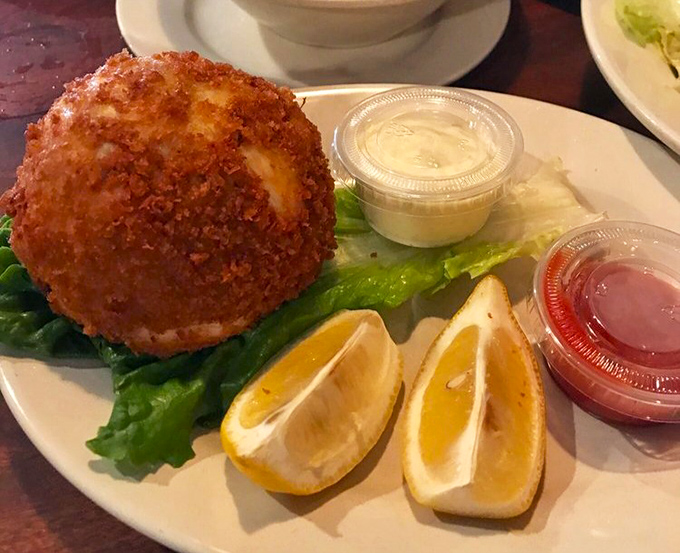 Golden-brown perfection meets the sea. This crab cake has the ideal crispy exterior while maintaining that sweet, delicate crab flavor inside.