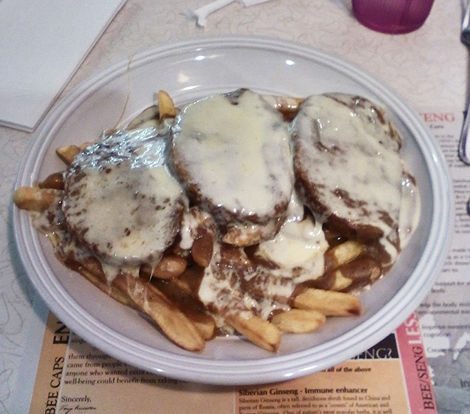 Comfort food that would make your grandmother jealous&mdash;tender meatloaf smothered in gravy atop a mountain of fries. Diet plans come here to die gloriously.
