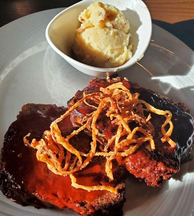 This isn't just meatloaf&mdash;it's what meatloaf dreams of becoming when it grows up, complete with crispy onion strings that add textural magic.