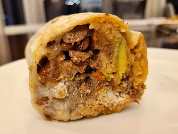 The Mission-style super burrito in its natural habitat&mdash;perfectly grilled, expertly wrapped, and ready to cure whatever ails you.