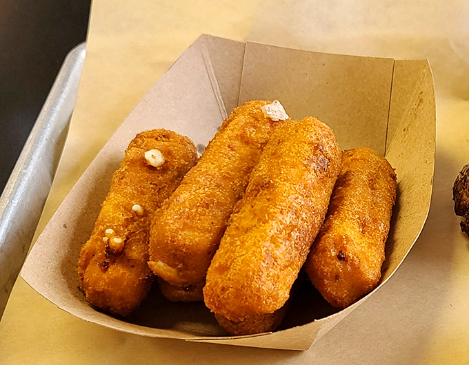 Golden, crispy mozzarella sticks that pull apart with that Instagram-worthy cheese stretch. The ultimate comfort food currency.