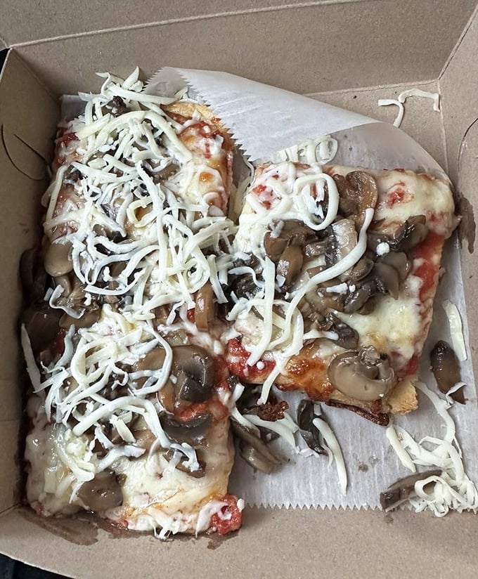 Those mushrooms aren't just toppings – they're little umami bombs ready to explode with flavor.