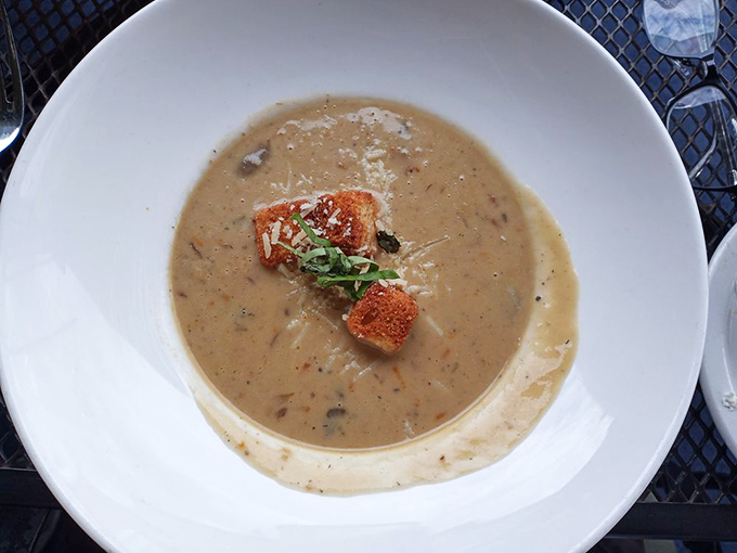 This isn't just mushroom soup; it's a soul-warming elixir that makes you wonder why anyone would ever open a can again. The crouton isn't garnish&mdash;it's necessary punctuation.