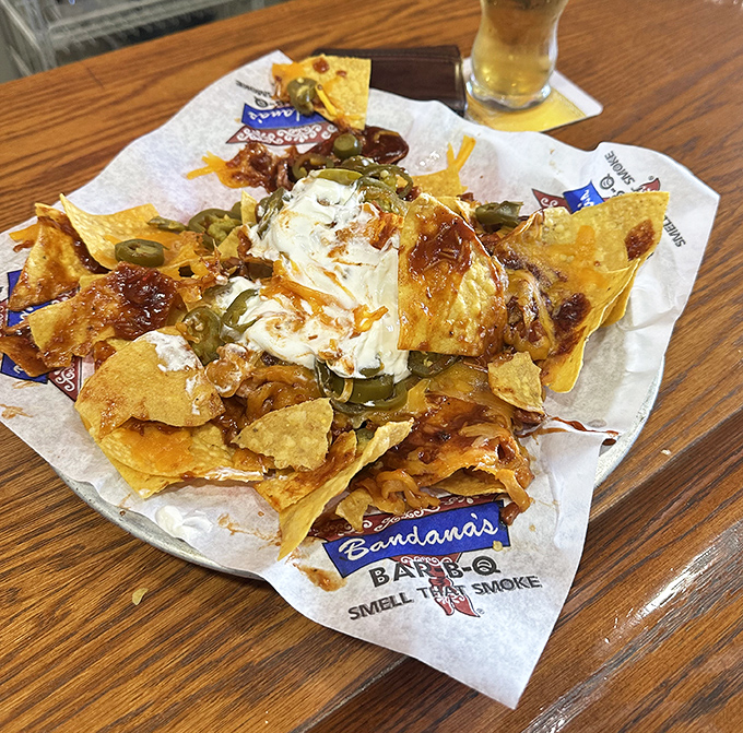 These aren't your average nachos &ndash; they're a mountain of chips crowned with pulled pork, jalape&ntilde;os, and enough cheese to make Wisconsin proud.