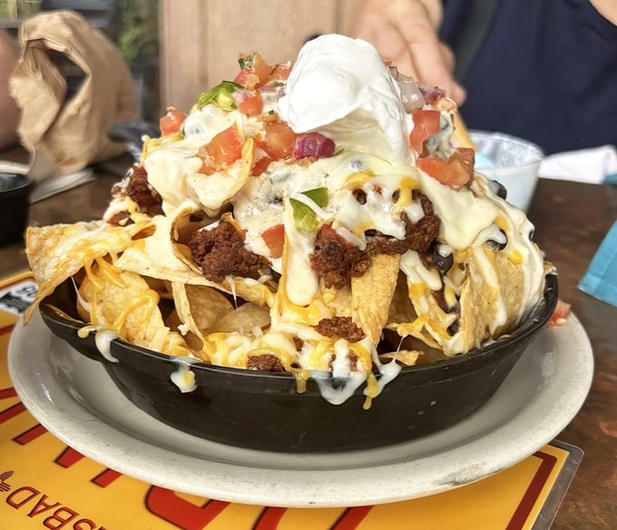 These nachos aren't messing around. Loaded with enough toppings to qualify as a geological formation, they're a mountain worth conquering.