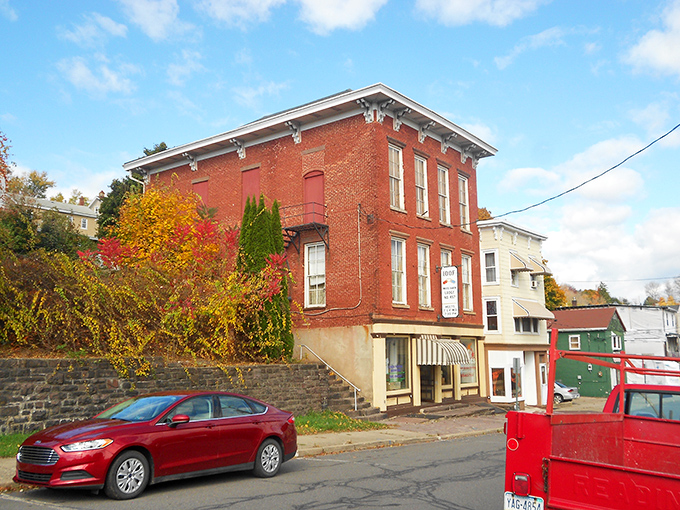 The historic Odd Fellows Lodge building showcases the beautiful brick architecture that defines this mountain community.