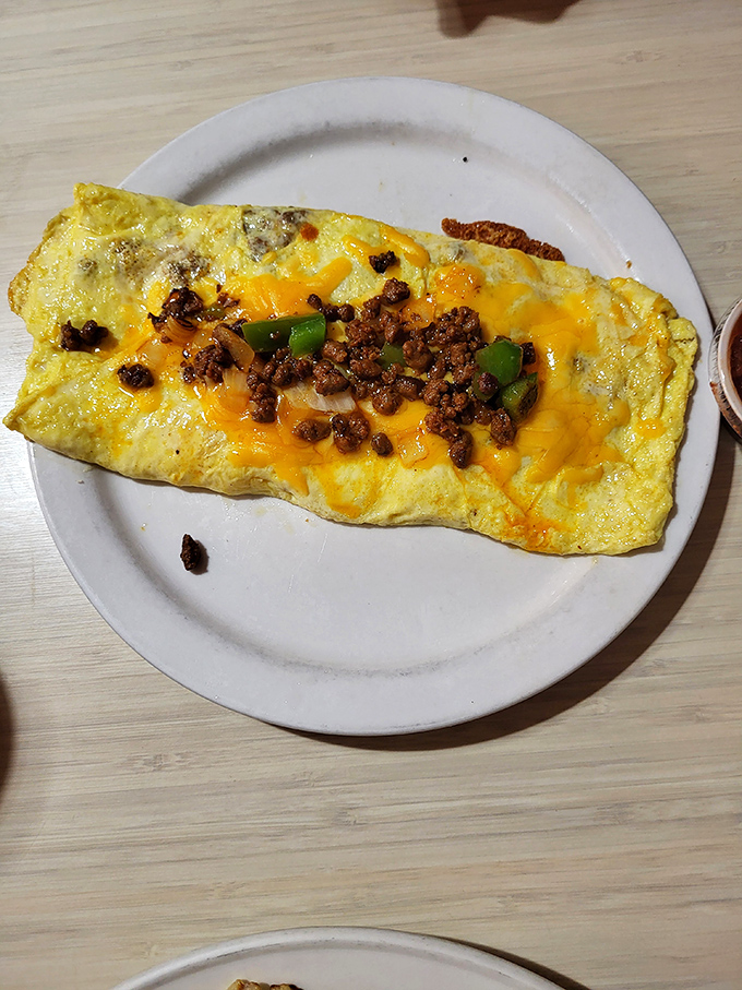 Behold the Mexican omelet in all its glory&mdash;where perfectly folded eggs cradle chorizo, peppers, and melted cheese in a breakfast masterpiece.