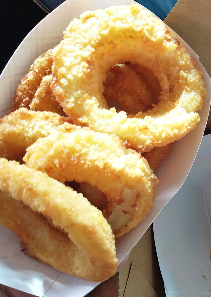 Golden halos of happiness&mdash;these onion rings achieve that perfect crunch-to-softness ratio that has launched a thousand road trips.