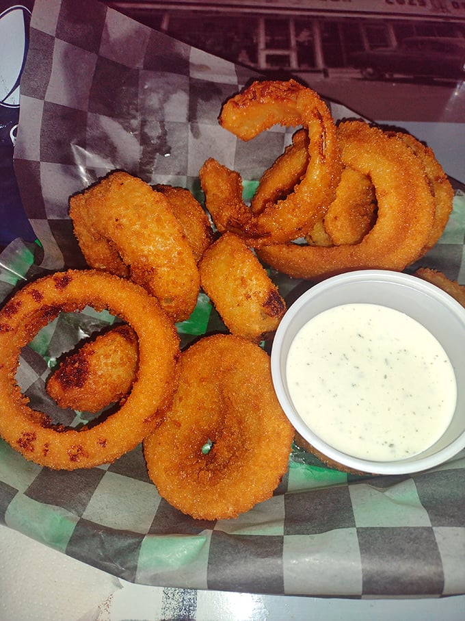 Golden halos of crispy perfection that would make any road-weary traveler weep with joy. Onion rings: the edible bracelets of happiness.
