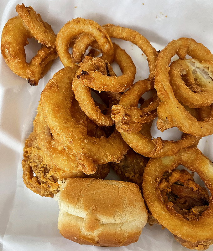Onion rings that demand respect&mdash;crispy, substantial, and unapologetically golden. The perfect supporting actor to the chicken's starring role.
