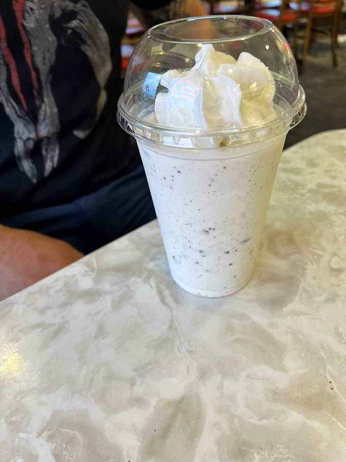 The Oreo milkshake arrives like a cloud of nostalgia in a cup&mdash;thick enough to challenge your straw but worth every delicious effort.