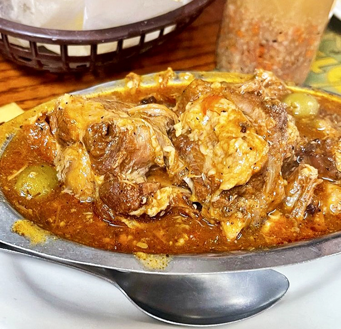 Oxtail stew that's been simmering since before your last relationship ended, tender enough to make you forget all your troubles.