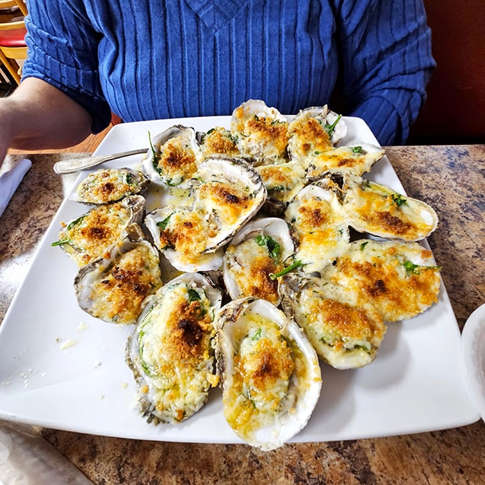 Oysters Rockefeller dressed to impress, proving that some classics never go out of style.