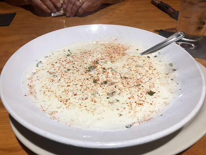 This isn't just soup&mdash;it's a warm hug in a bowl. The oyster stew's velvety broth, flecked with herbs and spice, whispers "comfort" with every spoonful. 