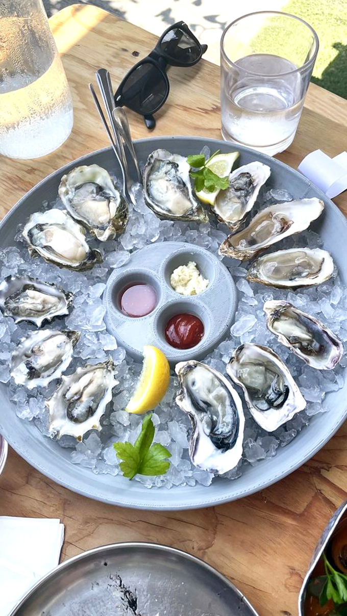 These oysters aren't just served; they're presented on a throne of ice &ndash; briny jewels waiting for their lemon crown.