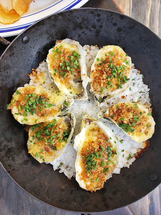These aren't just oysters Rockefeller&mdash;they're oysters that clearly made some excellent investments. The golden-brown crust hides creamy decadence beneath.