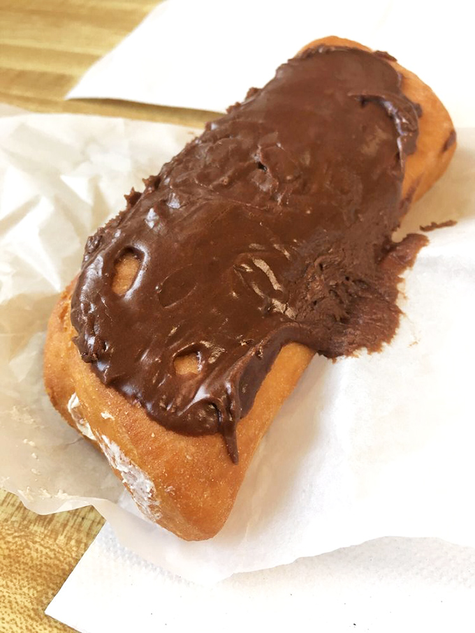 This chocolate-topped long john isn't just a donut &ndash; it's a commitment, a relationship, a love affair between chocolate and dough.