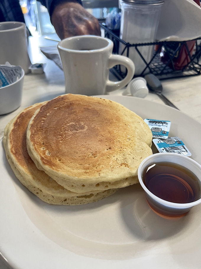These pancakes aren't just breakfast, they're an event. Golden-brown, fluffy, and large enough to use as a flotation device in Tampa Bay.
