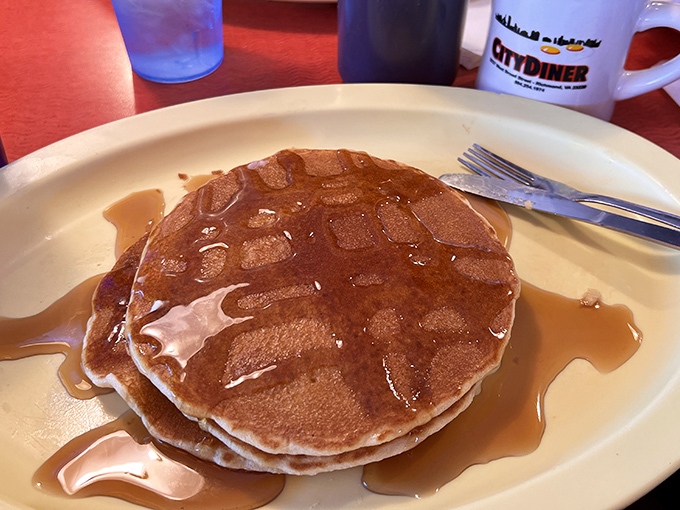 These pancakes aren't just breakfast, they're an engineering marvel&mdash;perfectly golden discs swimming in maple syrup that would make Vermont jealous.