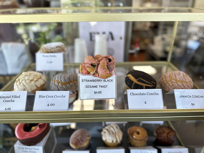 Pastry case perfection that would make Paul Hollywood drop his handshake midair. The blue corn concha is calling your name.