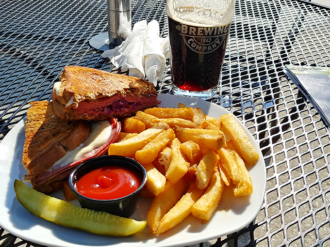 This isn't just a sandwich; it's a masterclass in comfort food architecture &ndash; layers of melty cheese and savory meat between perfectly griddled bread.