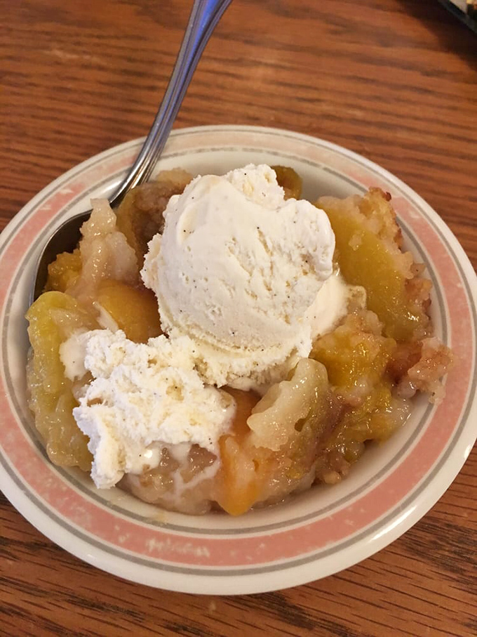 Peach cobbler with ice cream melting into warm fruit&mdash;proof that sometimes the simplest pleasures are worth driving across three counties for.