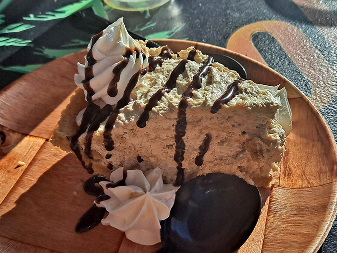 Peanut butter pie that demands a moment of silence. This decadent dessert, drizzled with chocolate, might be worth the drive alone.