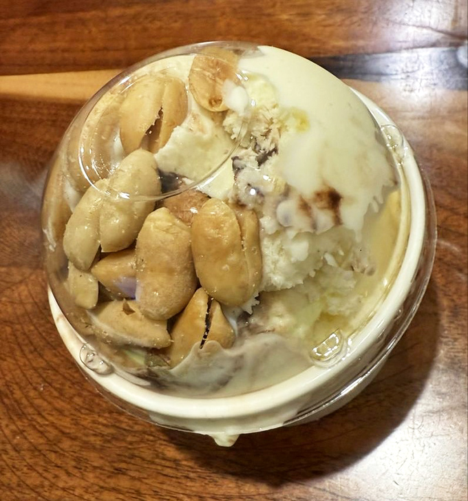Creamy homemade ice cream studded with peanuts&mdash;proof that dessert doesn't need a passport to take you somewhere extraordinary.